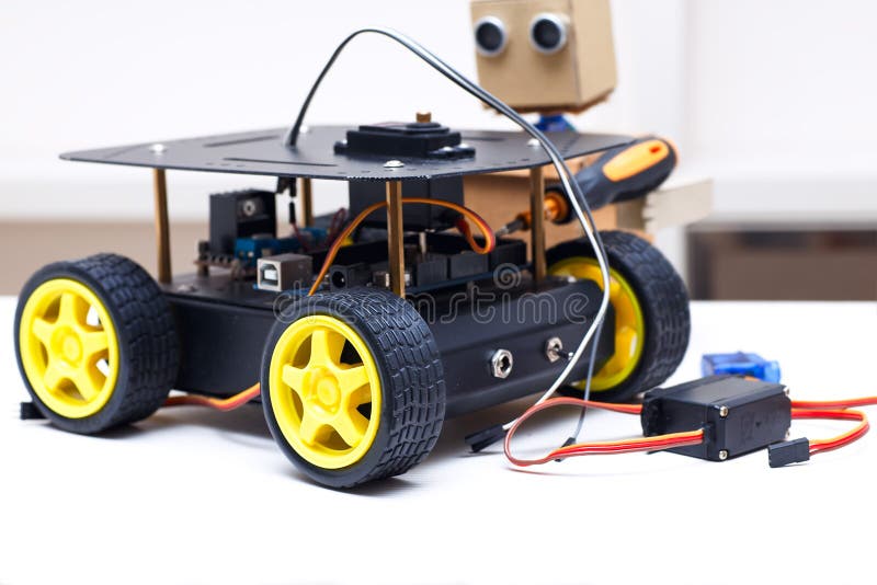 Assembly Robot on Wheels and Robot with Arms Stock Image - Image of ...