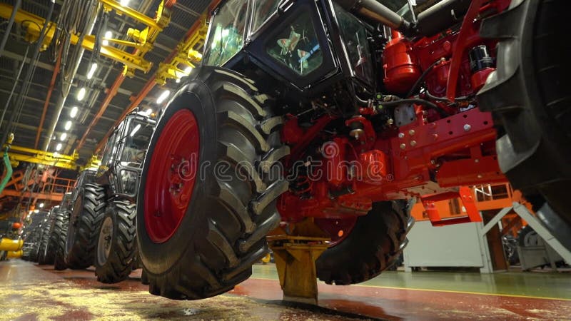 Assembly Shop of Heavy Tractors, Equipment is on the Conveyor, the ...
