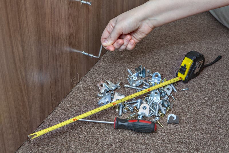 Assembly Wooden Furniture Brackets And Fasteners Close Up Hand Stock