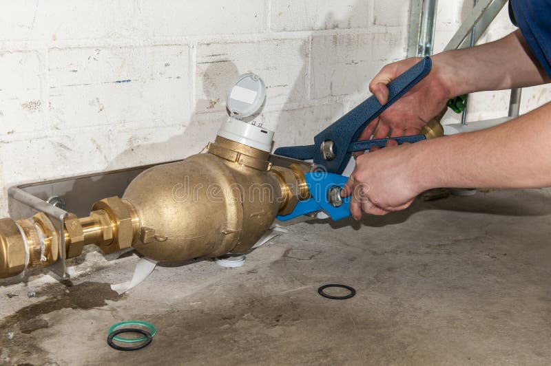 Assembly Work on a Water Meter Stock Photo - Image of routine, service ...