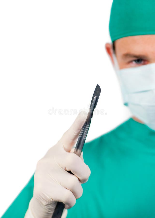 Assertive Male Surgeon Holding a Scalpel Stock Photo - Image of ...