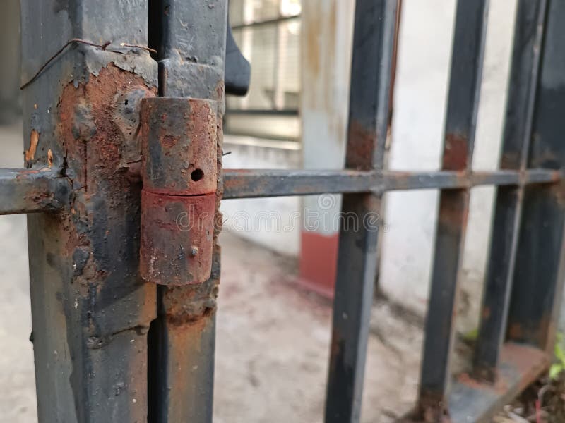 Assessing the Condition of Rusting and Deteriorating Iron Gate Hinges ...