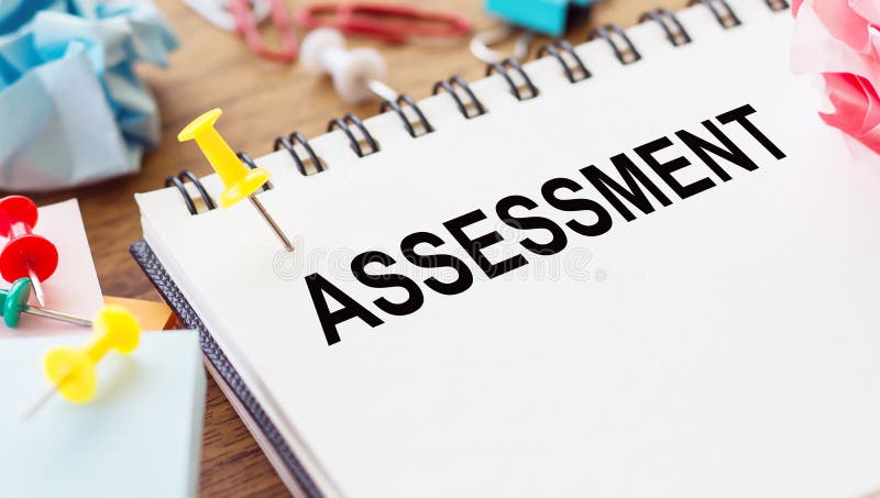 ASSESSMENT – Text on the Background of the Office Table. Business ... ASSESSMENT – Text on the Background of the Office Table. Business ...