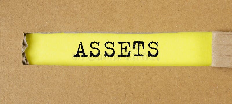 Assets Word Written on Yellow Paper through Torn Craft, Top View ...