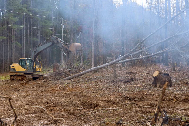 With Assistance of an Excavator Worker is Creating Space for House by ...