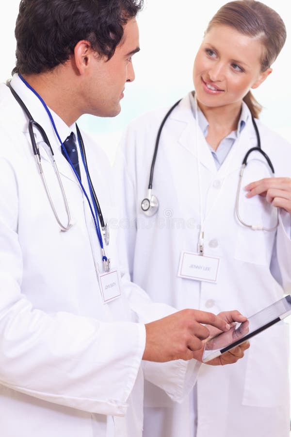 Assistant Doctors Talking about What S on the Tablet Stock Photo ...