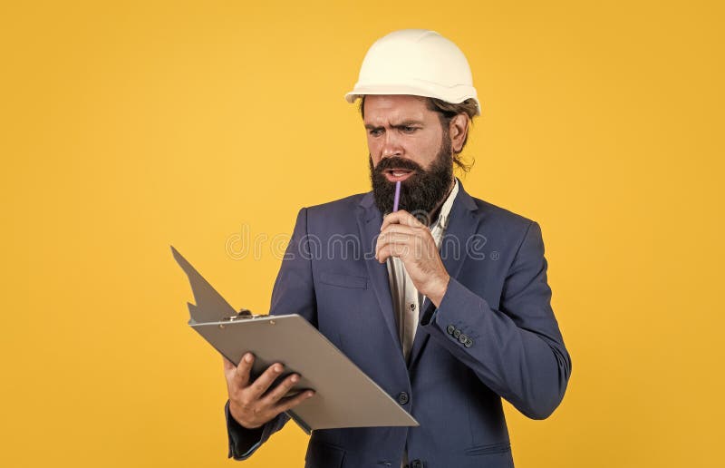 Assistant. Male Builder Wearing Formal Suit and Helmet for Protection ...