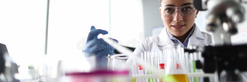 Assistant Pouring Liquid into Flask Stock Image - Image of glassware ...