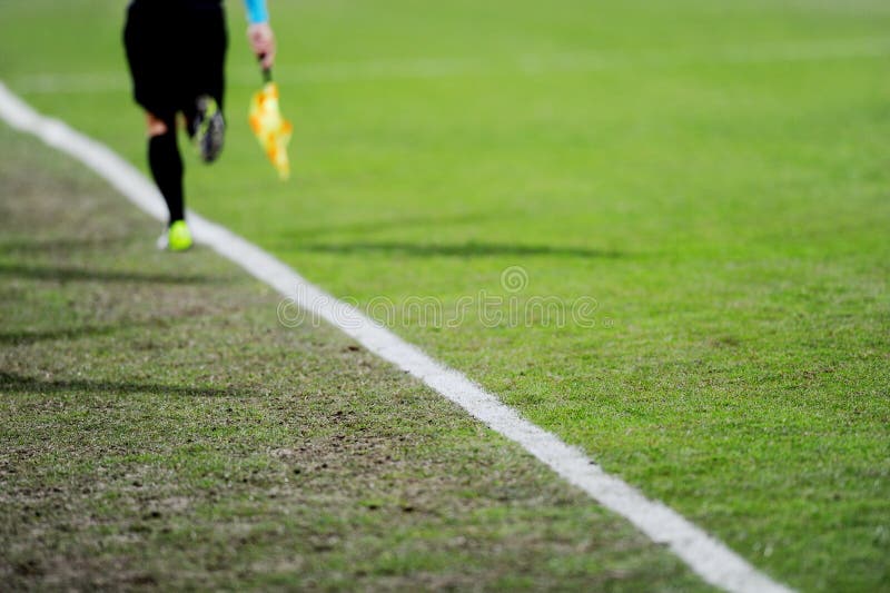 Assistant Referee in Action on a Soccer Field Stock Image - Image of ...