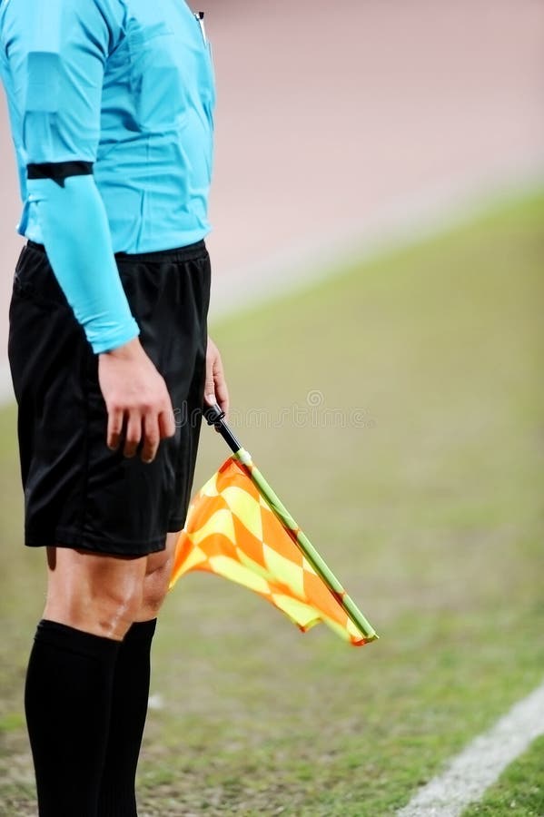 Assistant Referee Signaling with the Flag Stock Photo - Image of sports ...