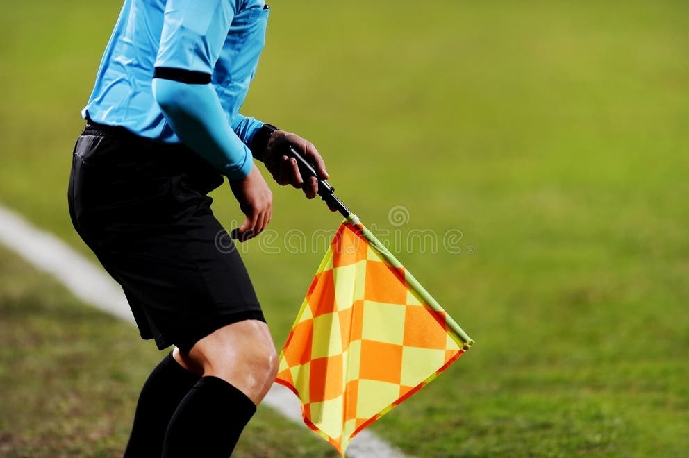 Assistant Referee Signalling with the Flag Stock Photo - Image of ...