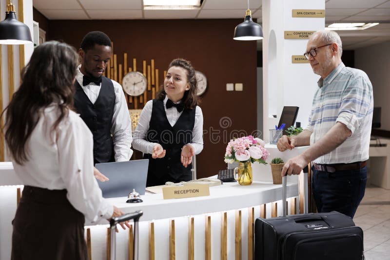 Hotel Check-in for Senior Couple Stock Image - Image of client, guest ...