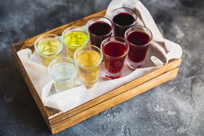 Assorted Alcoholic Cordials in a Wooden Box. Alcoholic Drinks Stock ...