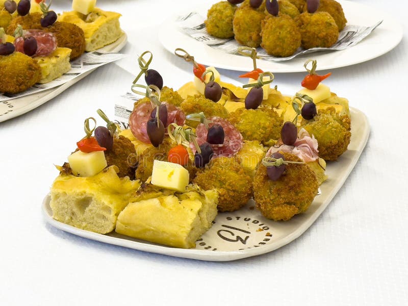 Assorted Appetizers with Cheese, Bread, Olives, and Salami on Platter ...