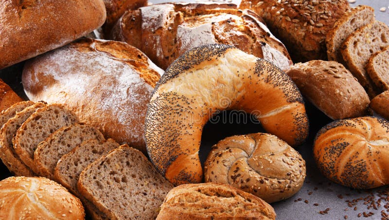 Assorted Bakery Products Including Loafs of Bread and Rolls Stock Image ...