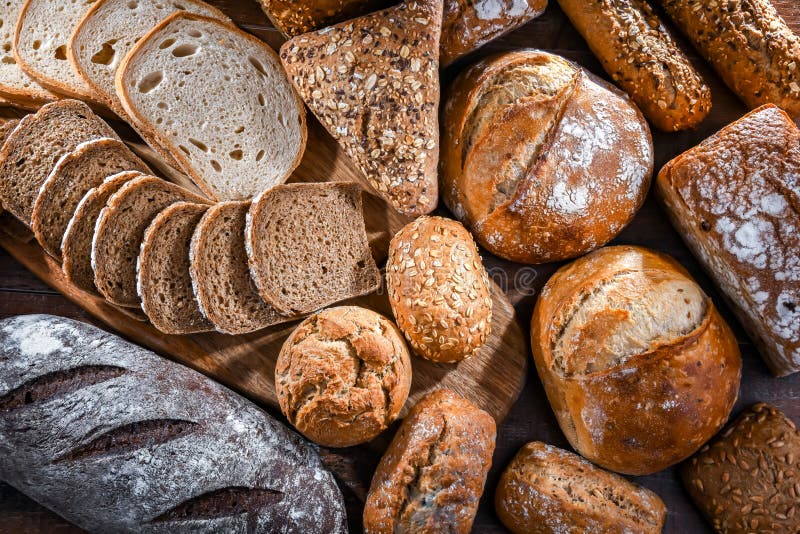 Assorted Bakery Products Including Loafs of Bread and Rolls Stock Image ...