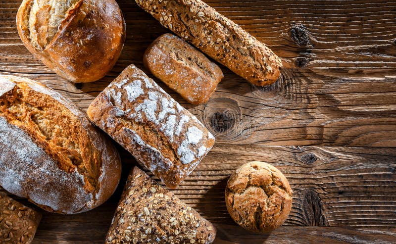 Assorted Bakery Products Including Loafs of Bread and Rolls Stock Photo ...