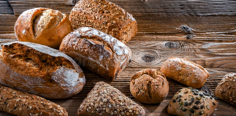 Assorted Bakery Products Including Loafs of Bread and Rolls Stock Image ...