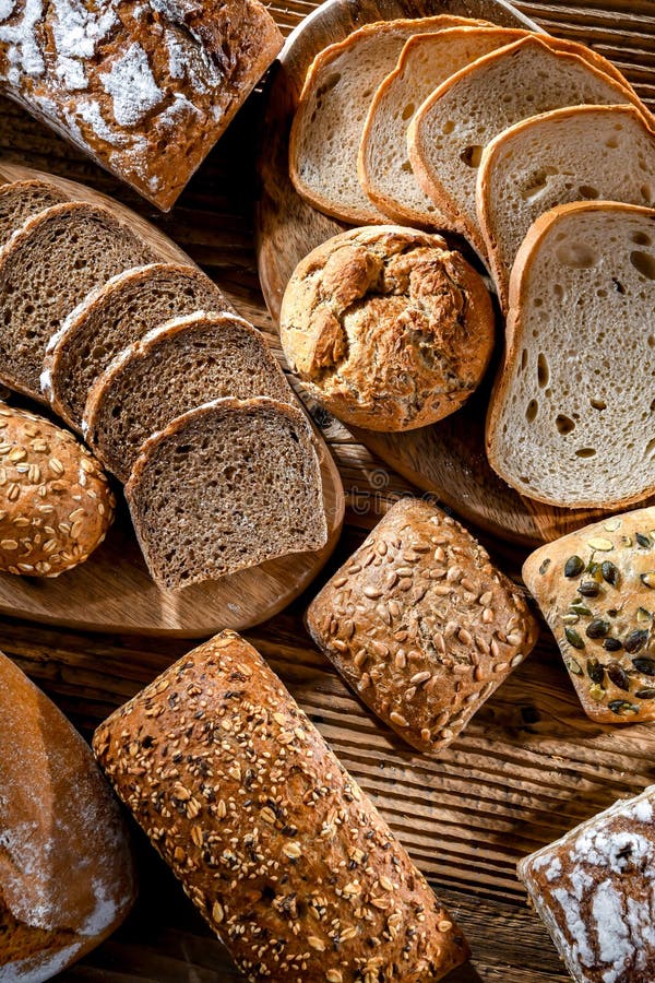 Assorted Bakery Products Including Loafs of Bread and Rolls Stock Photo ...