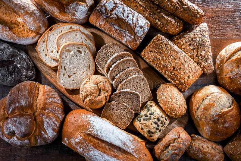 Assorted Bakery Products Including Loafs of Bread and Rolls Stock Image ...