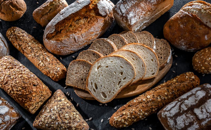 Assorted Bakery Products Including Loafs of Bread and Rolls Stock Image ...
