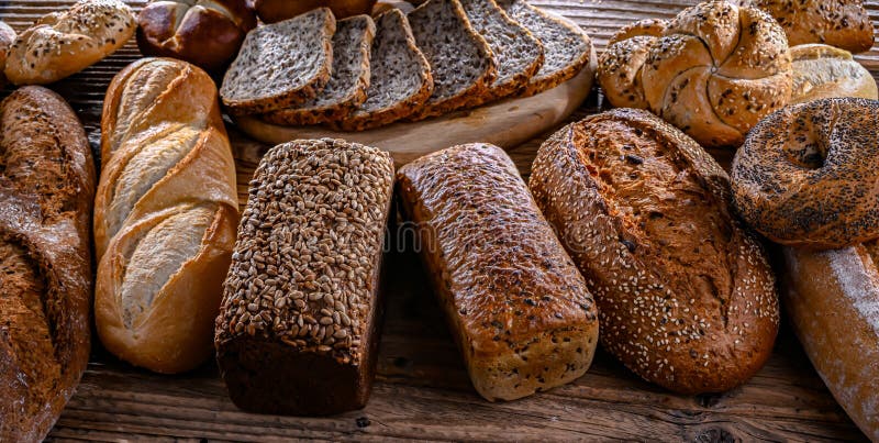 Assorted Bakery Products Including Loaves of Bread and Rolls Stock ...