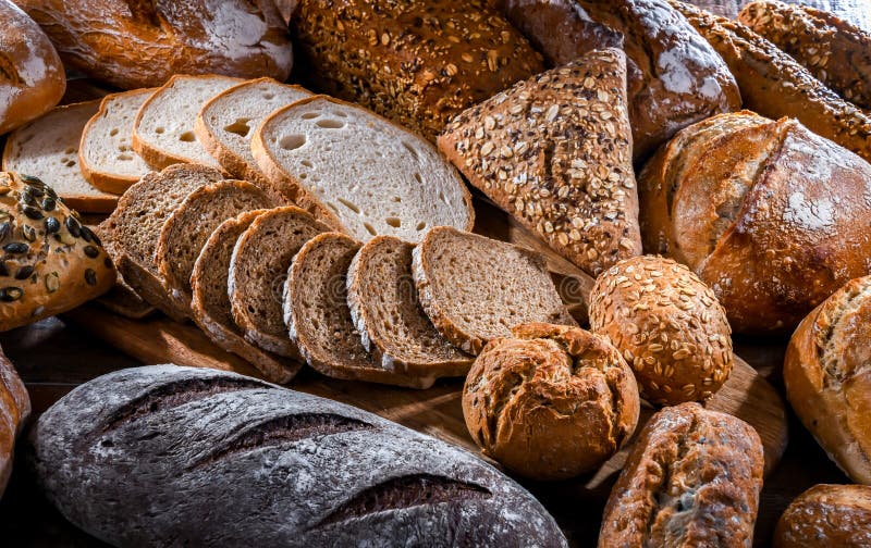Assorted Bakery Products Including Loaves of Bread and Rolls Stock ...