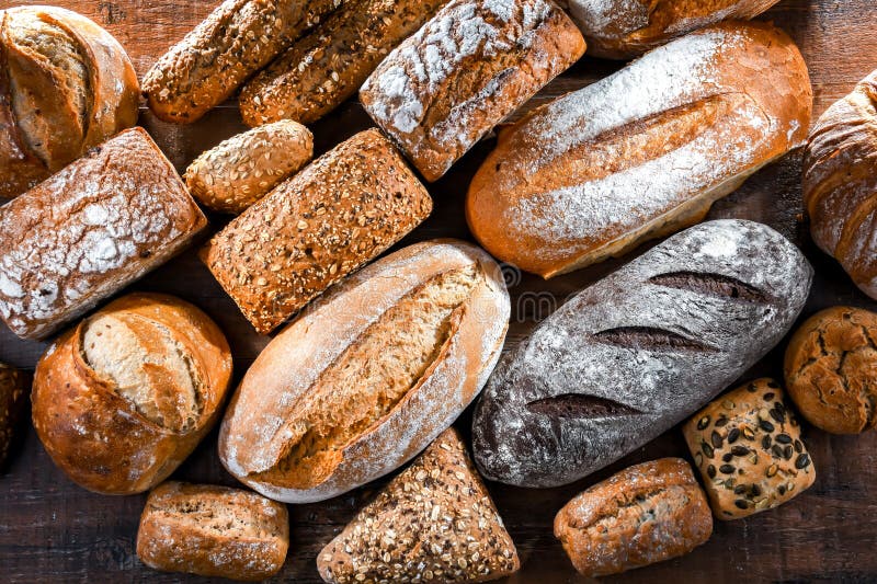 Assorted Bakery Products Including Loaves of Bread and Rolls Stock ...