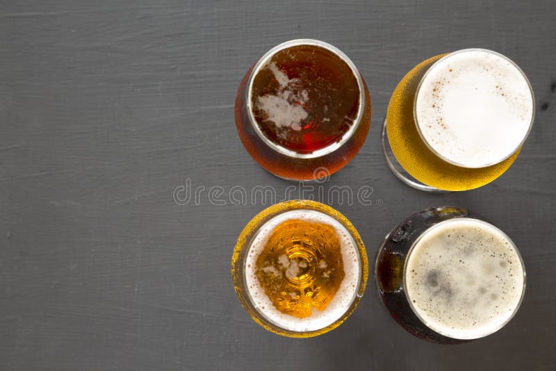 Assorted Beers on a White Wooden Surface, Top View. Overhead, from ...