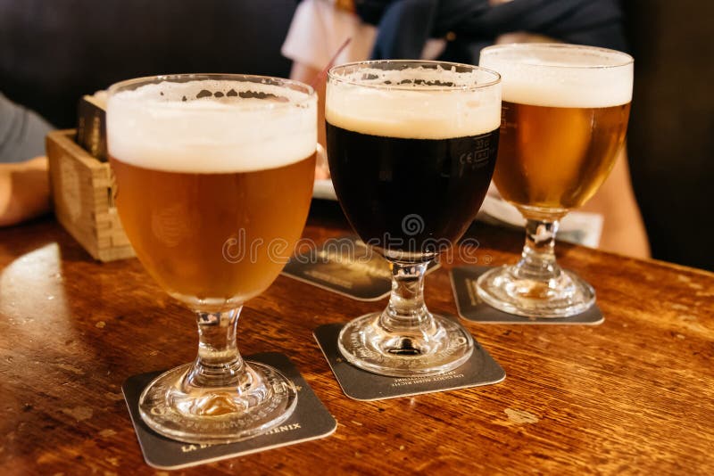 Assorted Beers in a Table stock image. Image of flight - 92101167