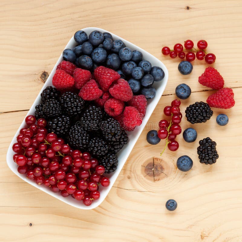 Assorted berries stock photo. Image of wood, currant - 33289394