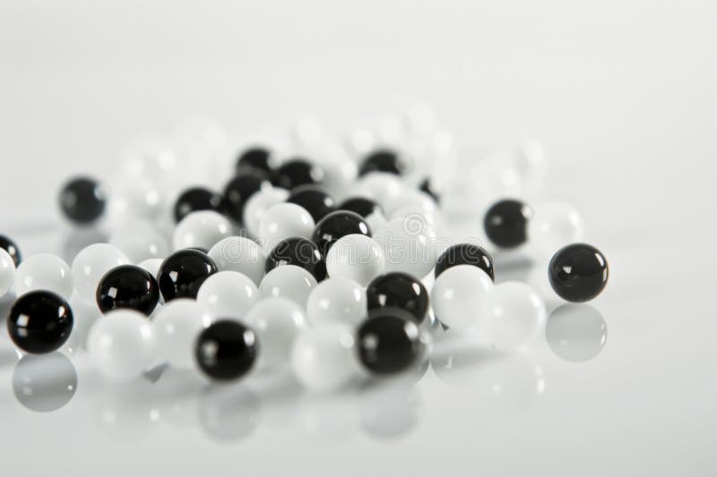 Assorted Black and White Beads on White Surface Stock Illustration ...
