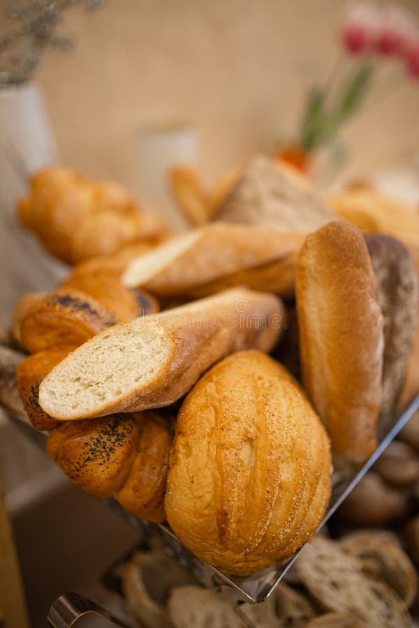 Assorted Bread Basket on the Buffet Table Stock Photo - Image of wheat ...