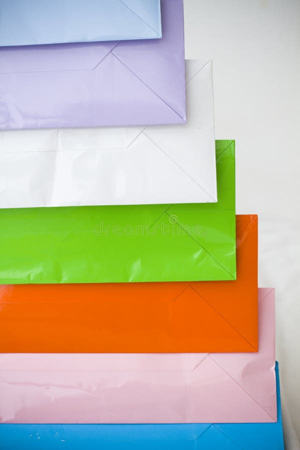Assorted Brightly Coloured Paper Gift Bags Stock Photo - Image of ...