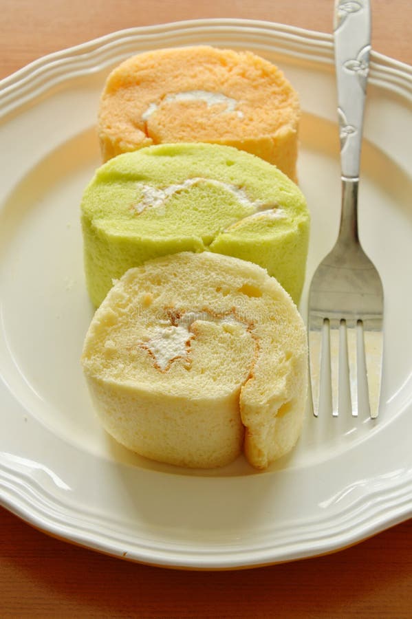 Assorted Cake Roll with Fork on Dish Stock Photo - Image of strawberry ...