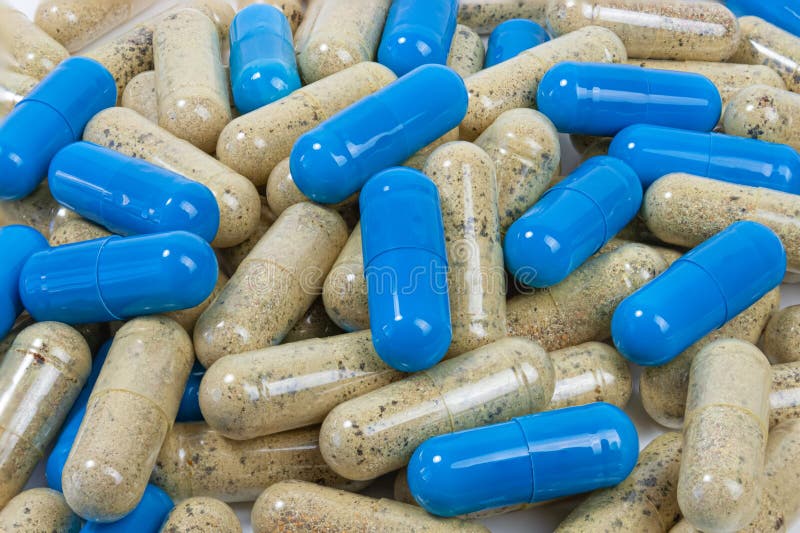 Assorted Capsules with Blue and Transparent Shells Stock Photo - Image ...