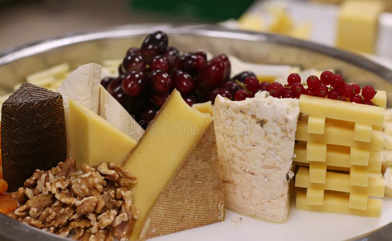 Assorted cheese platter stock photo. Image of isolated - 144710064