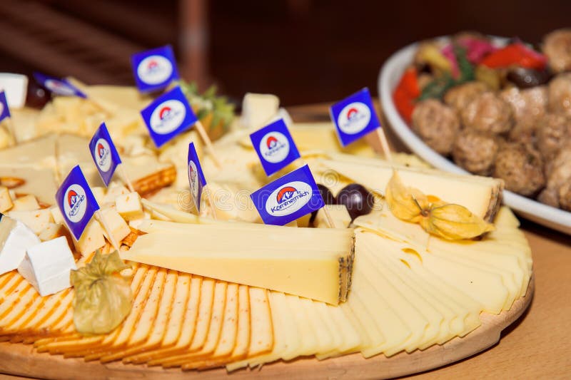 Assorted Cheese Platter with Flags and Side Dish of Vegetables and Meat ...