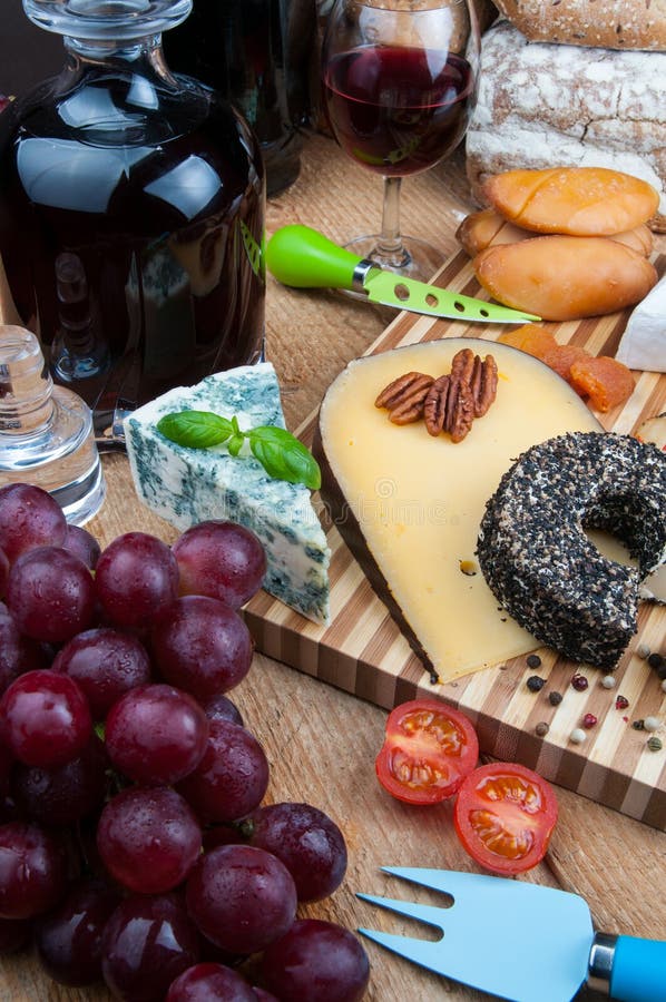 Assorted cheese on table stock photo. Image of chili - 73659414