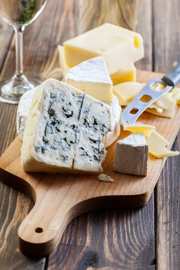 Assorted cheeses stock photo. Image of meal, cutting - 47519278