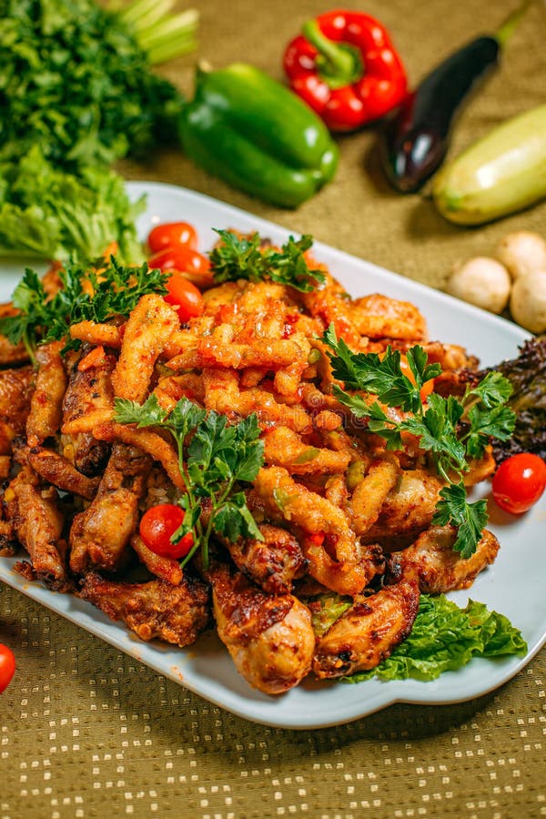 Assorted Chicken, a Dish for the Company, on a Decorated Table Stock ...