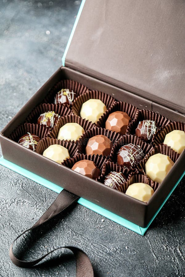 Assorted Chocolates Box on Table Stock Photo - Image of copy ...