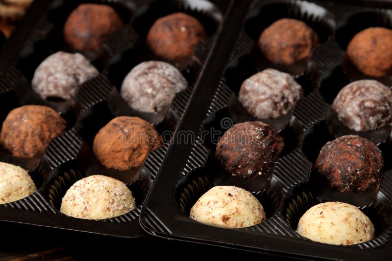 Assorted Chocolates. Candy Balls of Different Types of Chocolate in a ...