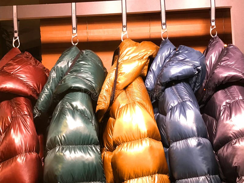 Assorted Coats Hanging on Coat Hanger Stock Photo - Image of coats ...