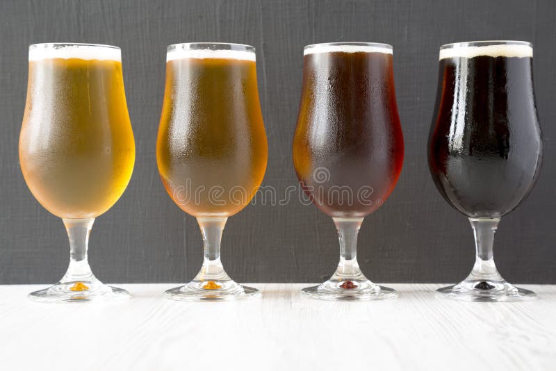 Assorted Beers on a White Wooden Surface, Top View. Overhead, from ...