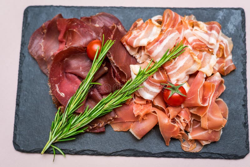 Assorted Cold Cuts with Herbs on a Plate. Horizontal Frame Stock Image ...