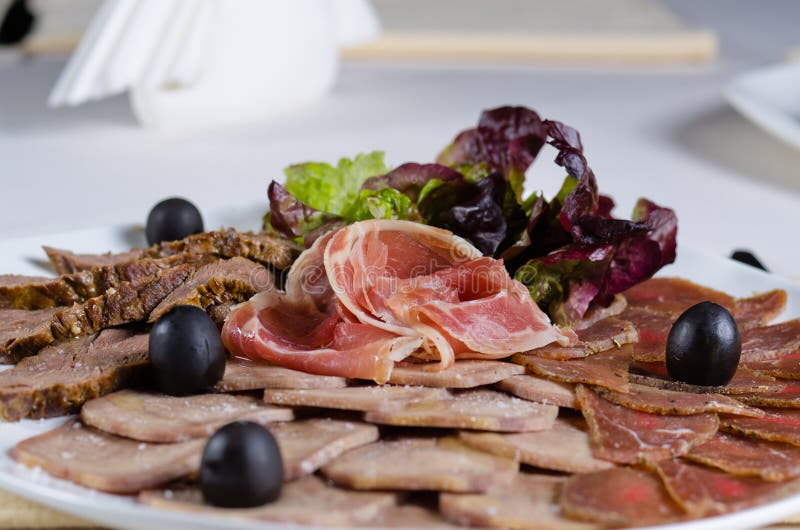 Assorted cold meat platter stock photo. Image of diet - 46582982