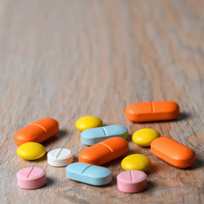 Assorted Color Tablets Close-up on the Table. Concept of Protection and ...