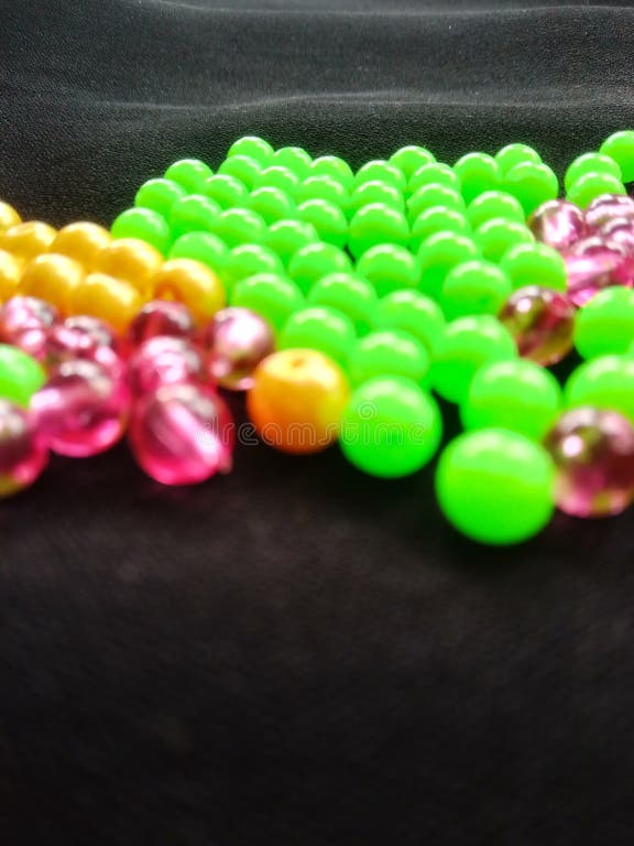 Assorted Colorful Beads on Textured Black Surface for Craft Projects ...