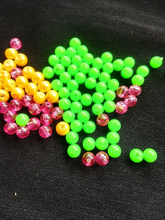 Assorted Colorful Beads on Textured Black Surface for Craft Projects ...